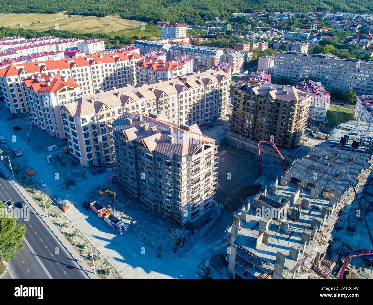 Construction of a residential neighborhood. Several buildings of the ...