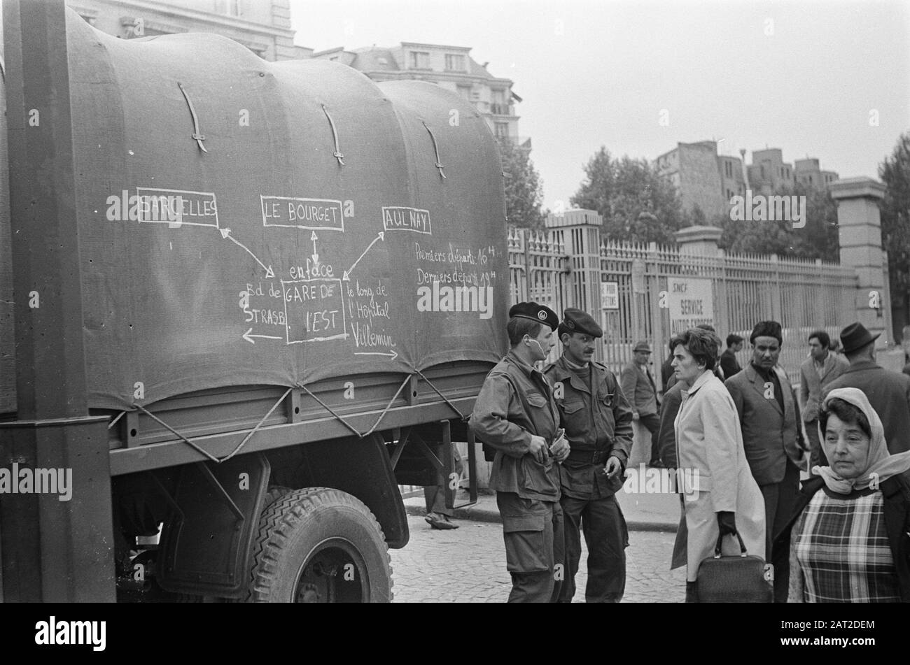 France. Assisting military personnel in transport Date: 28 May 1968 ...