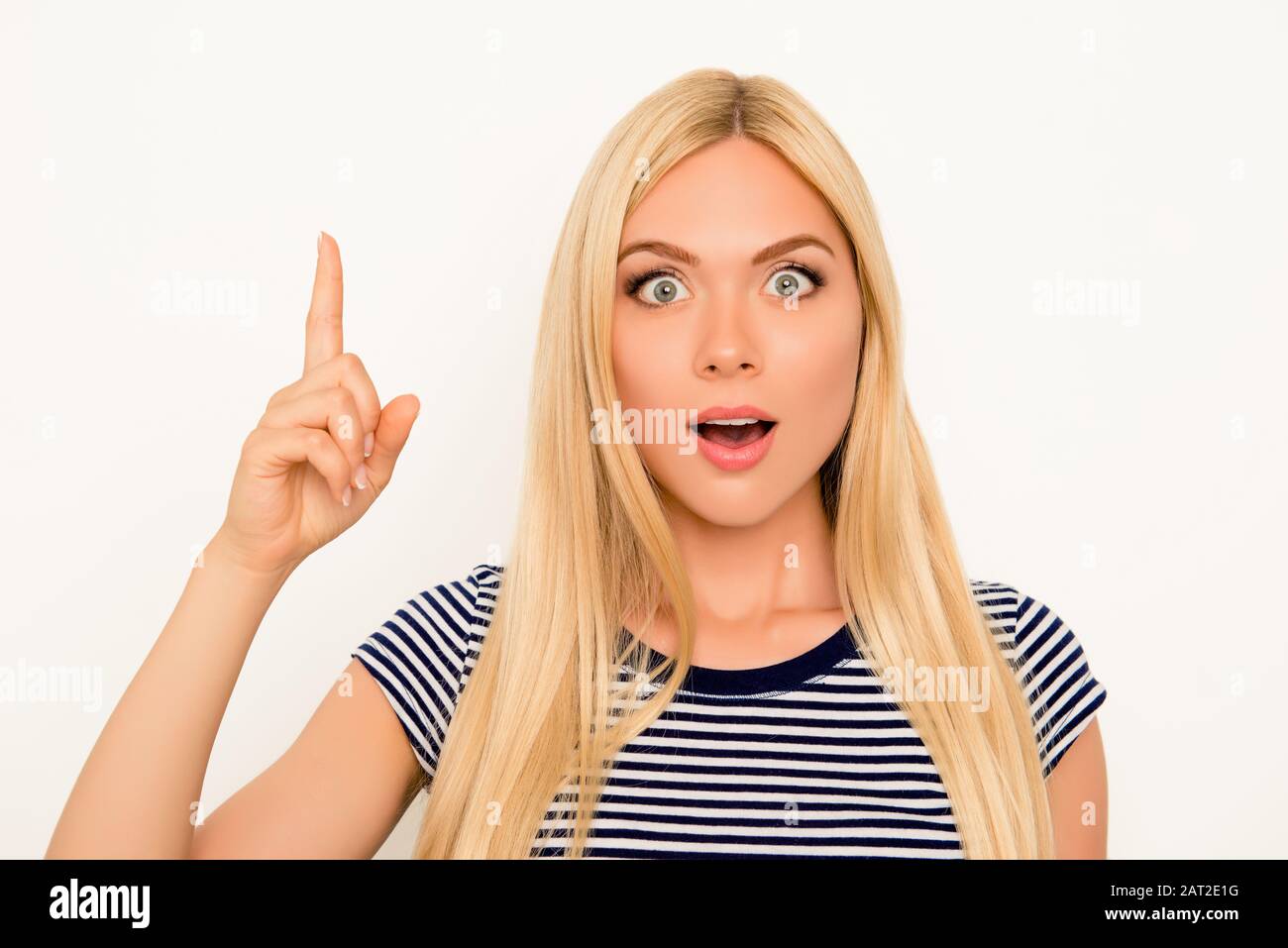Smart genius woman with raised finger having an ide Stock Photo - Alamy