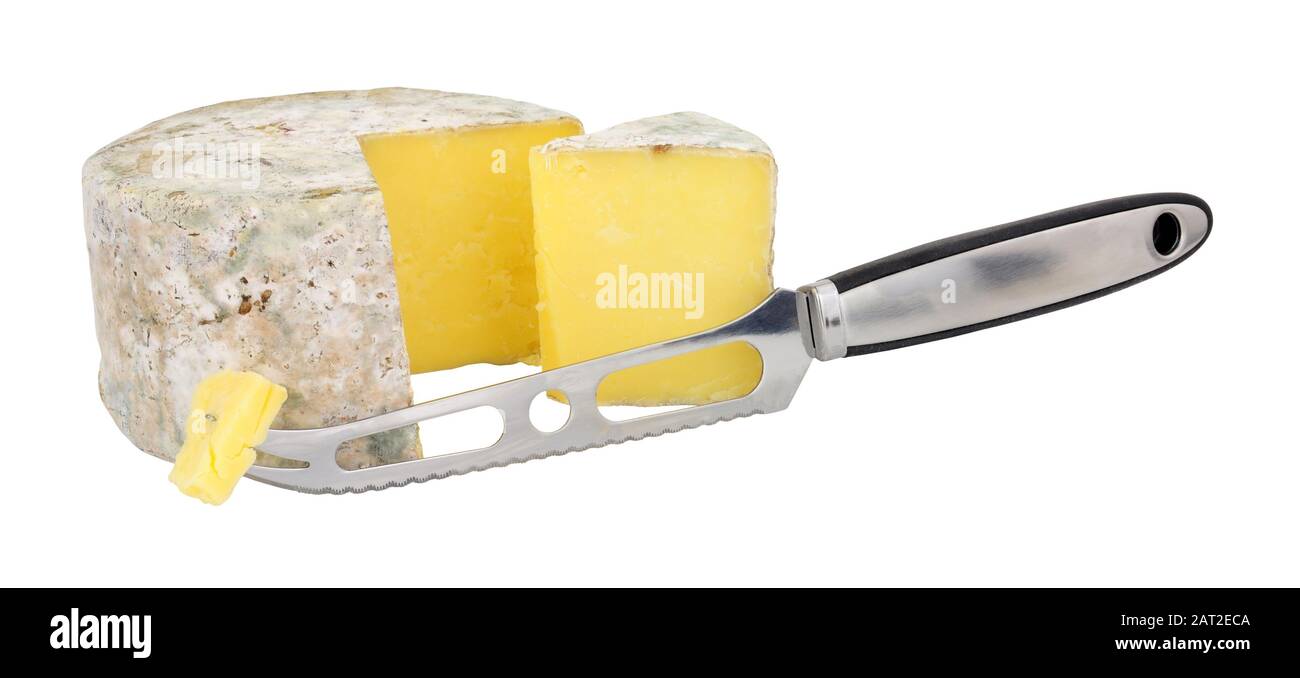 Cave aged farmhouse cheddar cheese with a cheese knife isolated on a ...