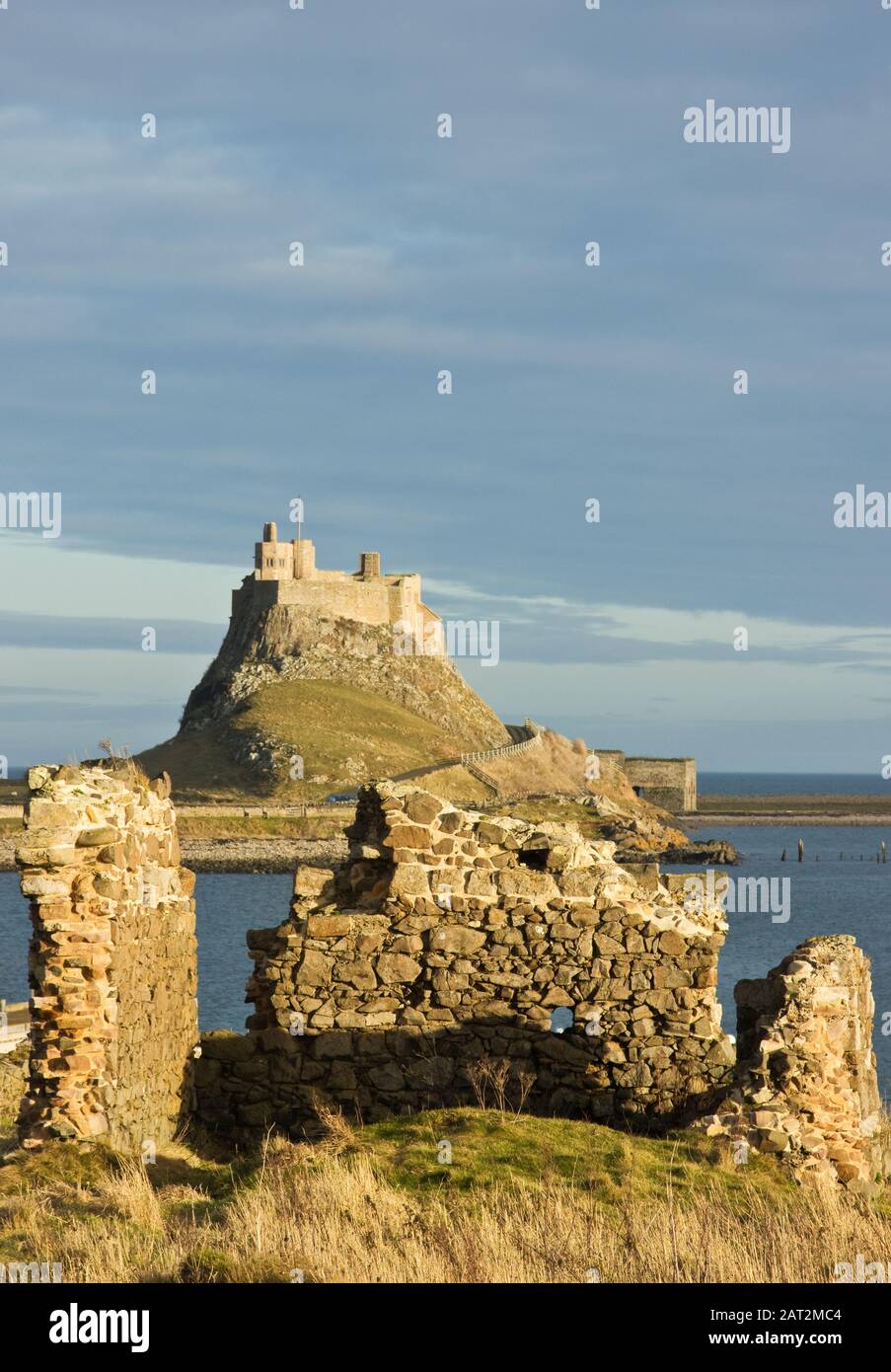 Ruins of Osborne's fort, with the castle in the background, Holy Island ...