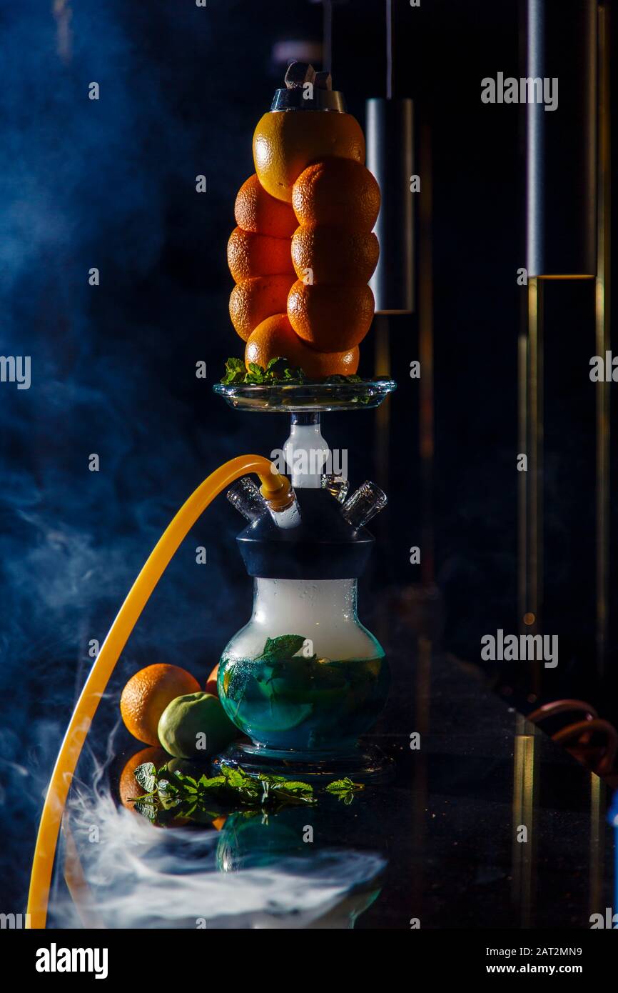 Hookah on the orange. Orange hookah. Hookah with a round transparent ...
