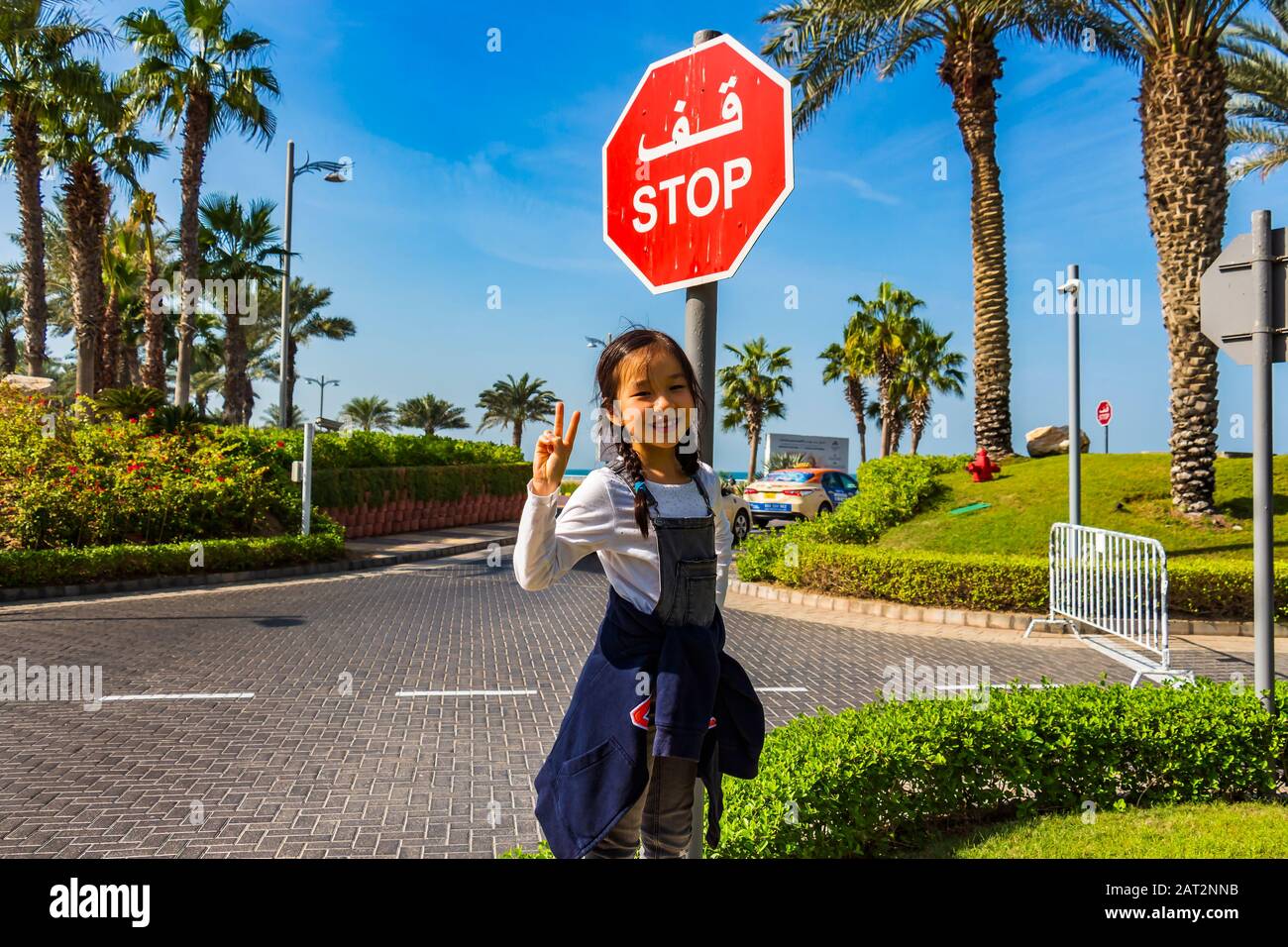 Palm Jumeirah, Dubai - 1st Jan 2020: Cute Asian girl posing for camera ...