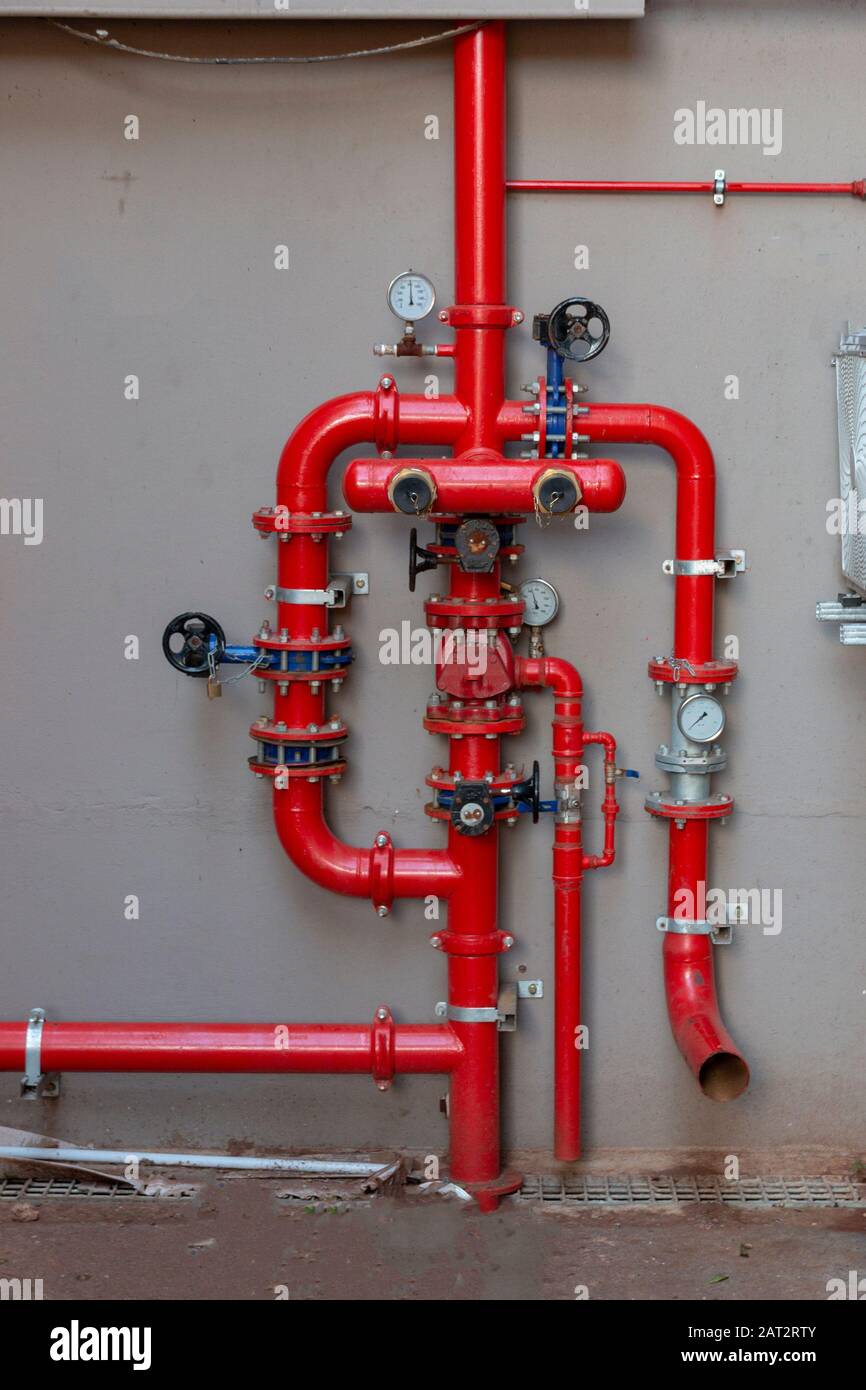 A close up view of a muilti-piped plumbing system Stock Photo - Alamy
