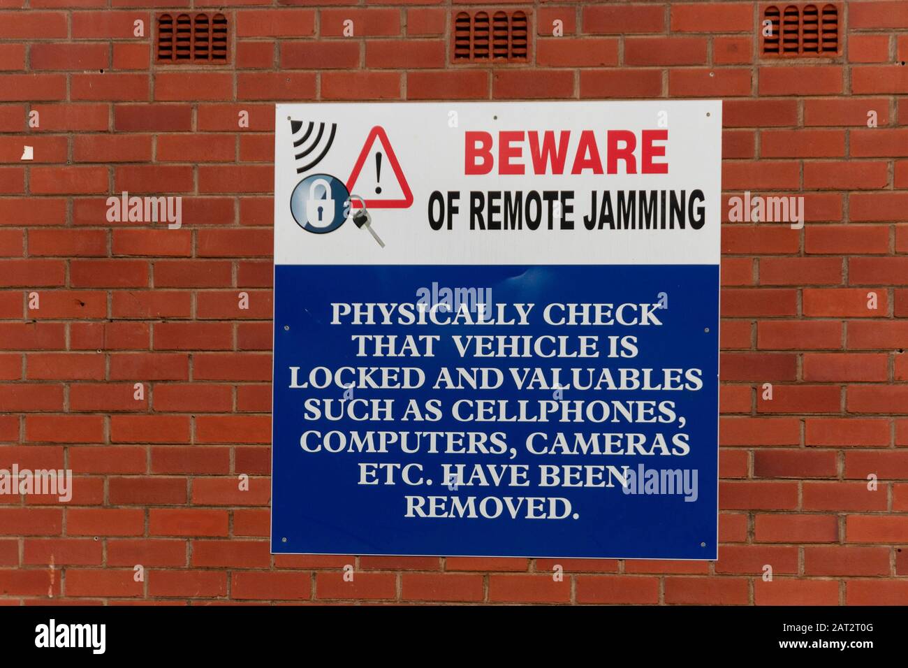 A close up view of a crime warning sign to check your cars are locked ...