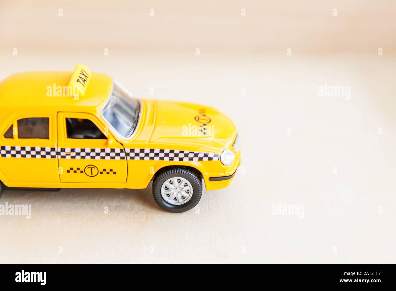 Simply design yellow vintage retro toy car Taxi Cab model on wooden ...