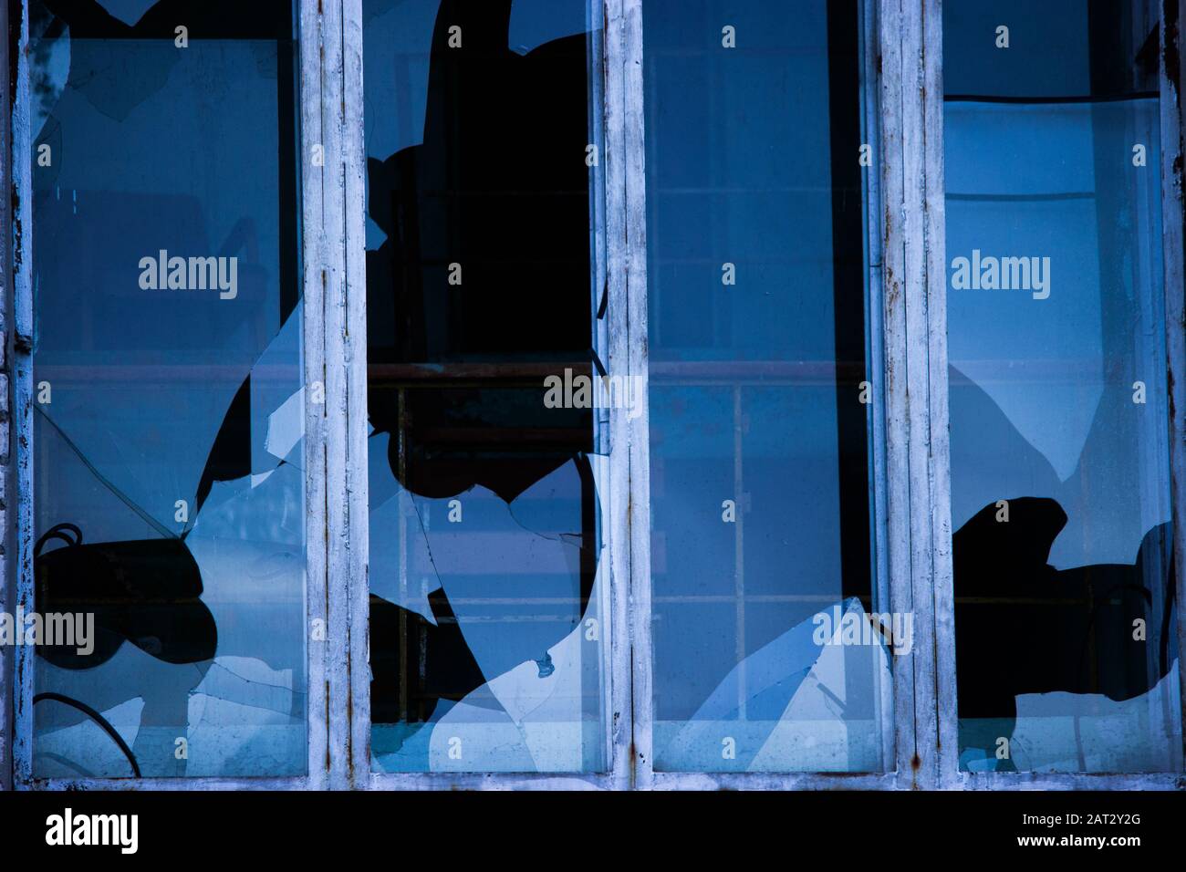 Broken window in the house. Close up Stock Photo - Alamy