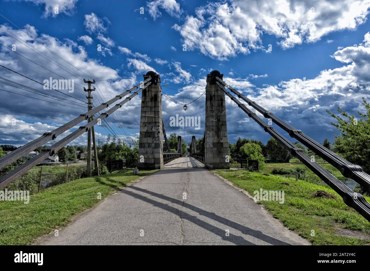 Stone pylons of the famous chain suspension bridge on the background of ...