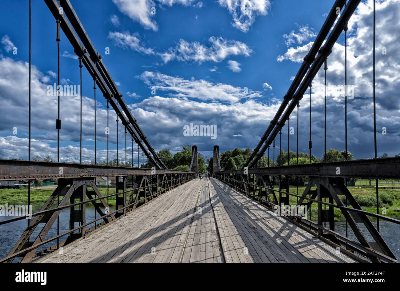 Unique chain cable-stayed bridge against a beautiful blue sky with ...