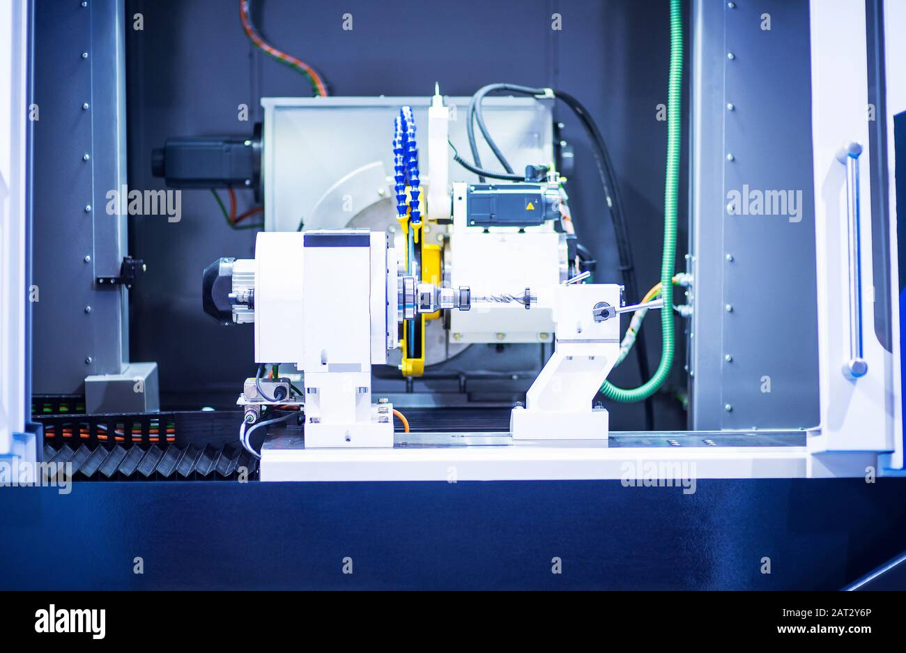 operator make automotive parts by cnc lathe and cnc grinding process ...