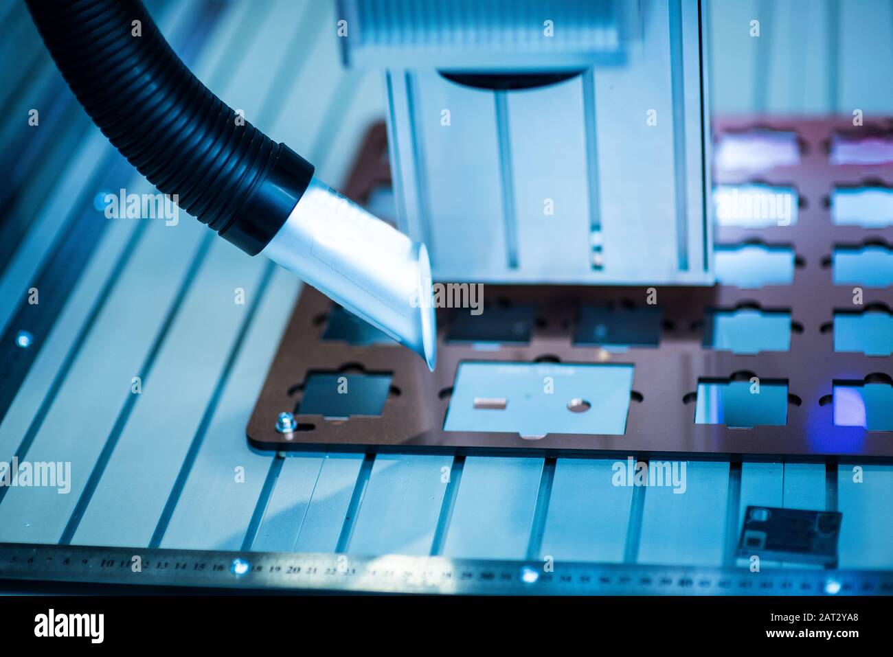 CNC lathe machine cooled by water during machining Stock Photo - Alamy