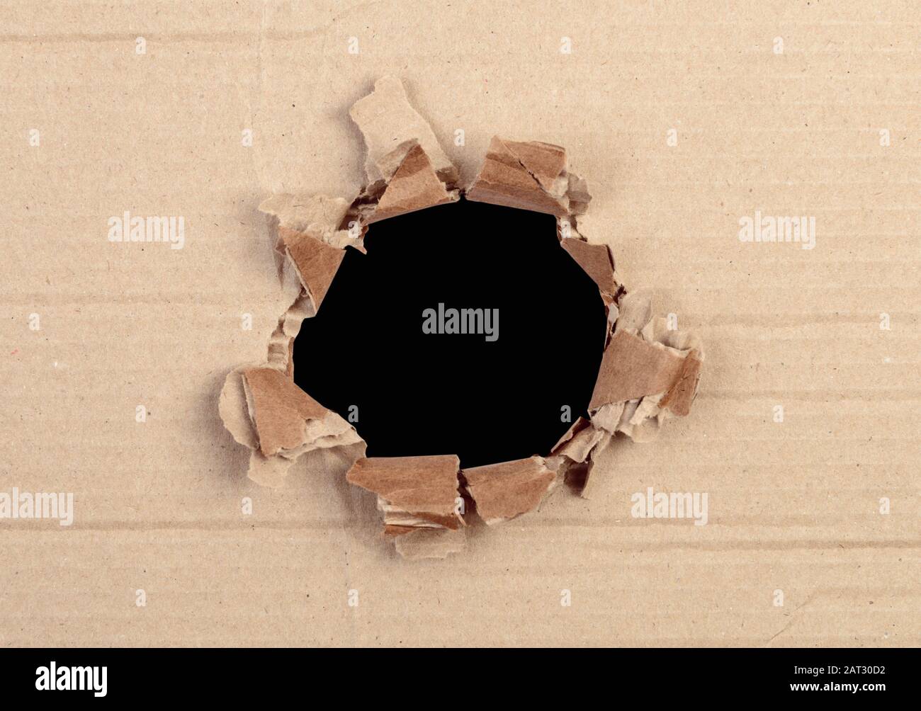 Hole cardboard hi-res stock photography and images - Alamy