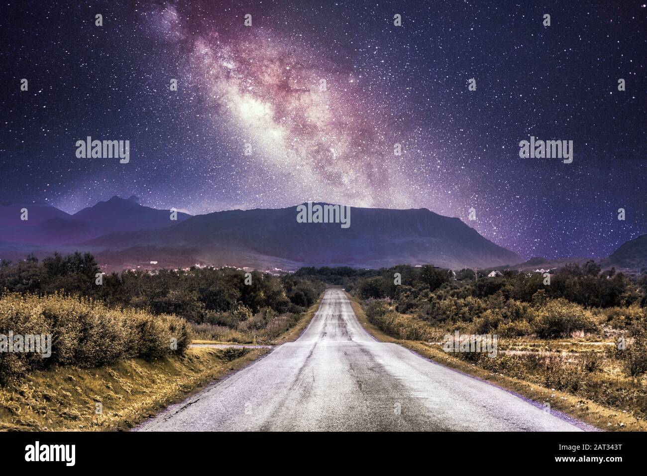Countryside road with mountains and the milky way galaxy Stock Photo ...