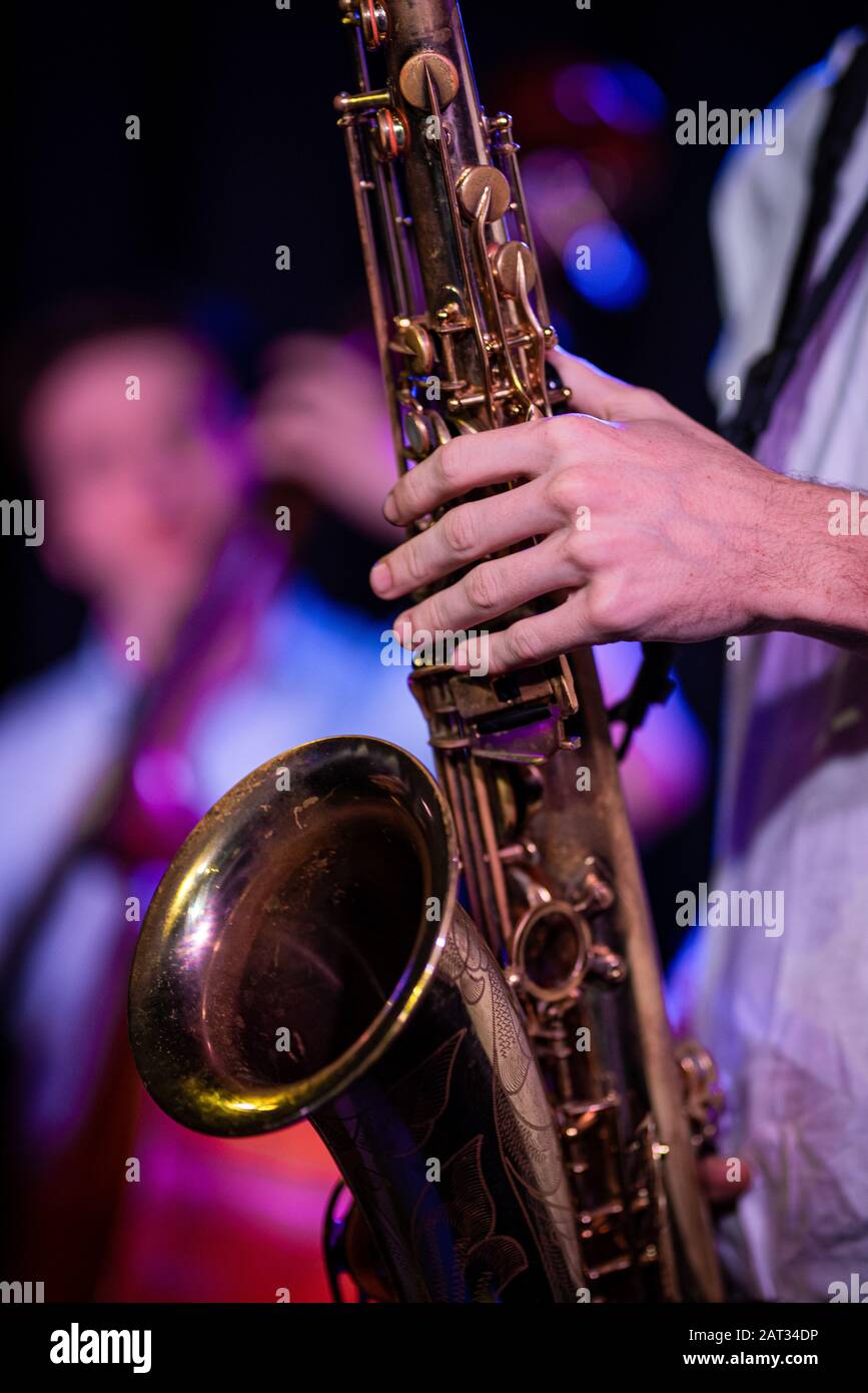Holding Saxophone High Resolution Stock Photography and Images - Alamy