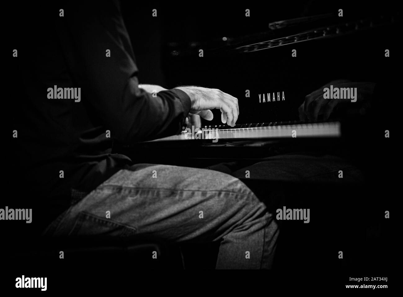 Man's hands on piano keys Stock Photo - Alamy