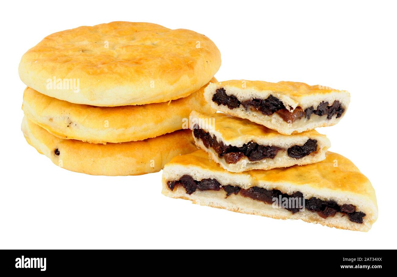 Traditional raisin filled Lancashire Chorley cakes isolated on a white ...