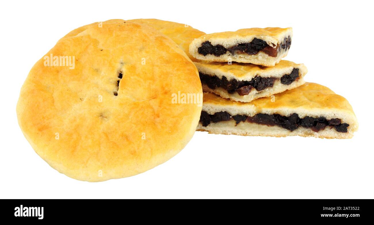 Traditional raisin filled Lancashire Chorley cakes isolated on a white ...