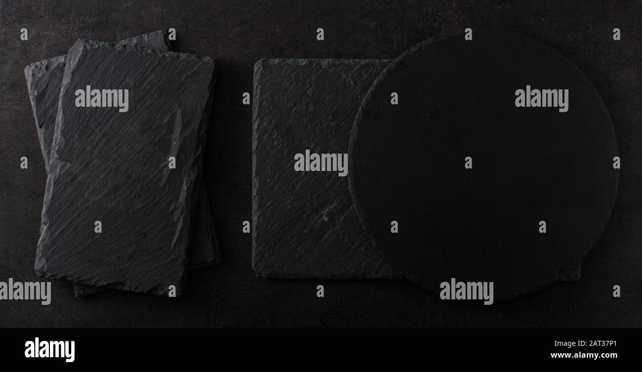 Black slate kitchenware background Stock Photo - Alamy