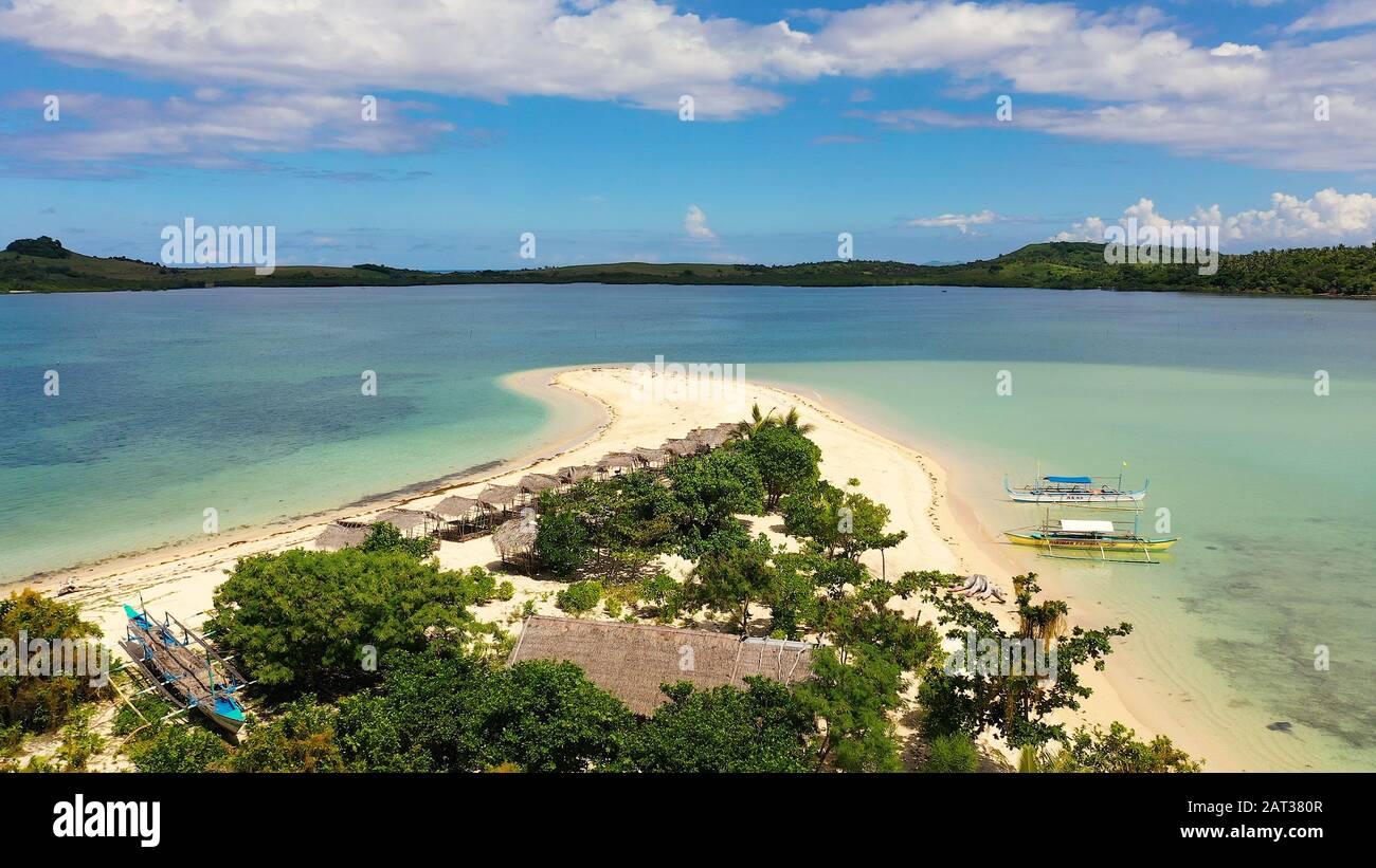 Cotivas Island Cottage. Wild white sand beach with coconut trees ...