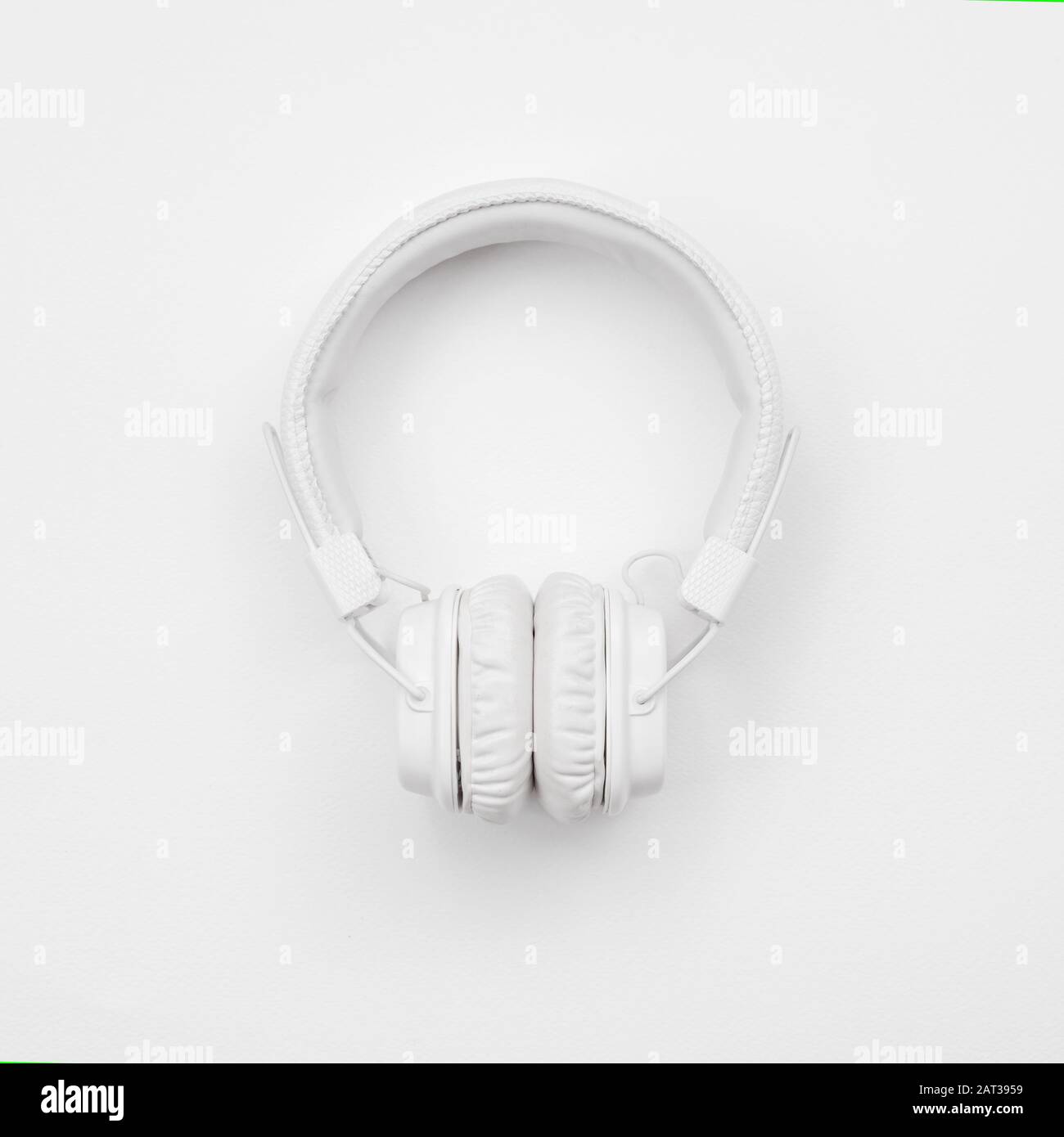 White wireless headphones isolated on a white background. Overhead ...