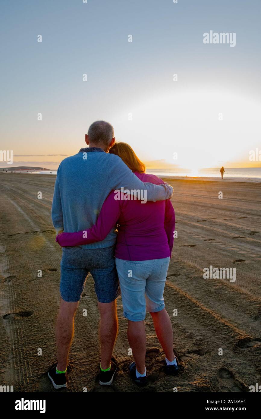 Man watching woman on beach hi-res stock photography and images - Alamy