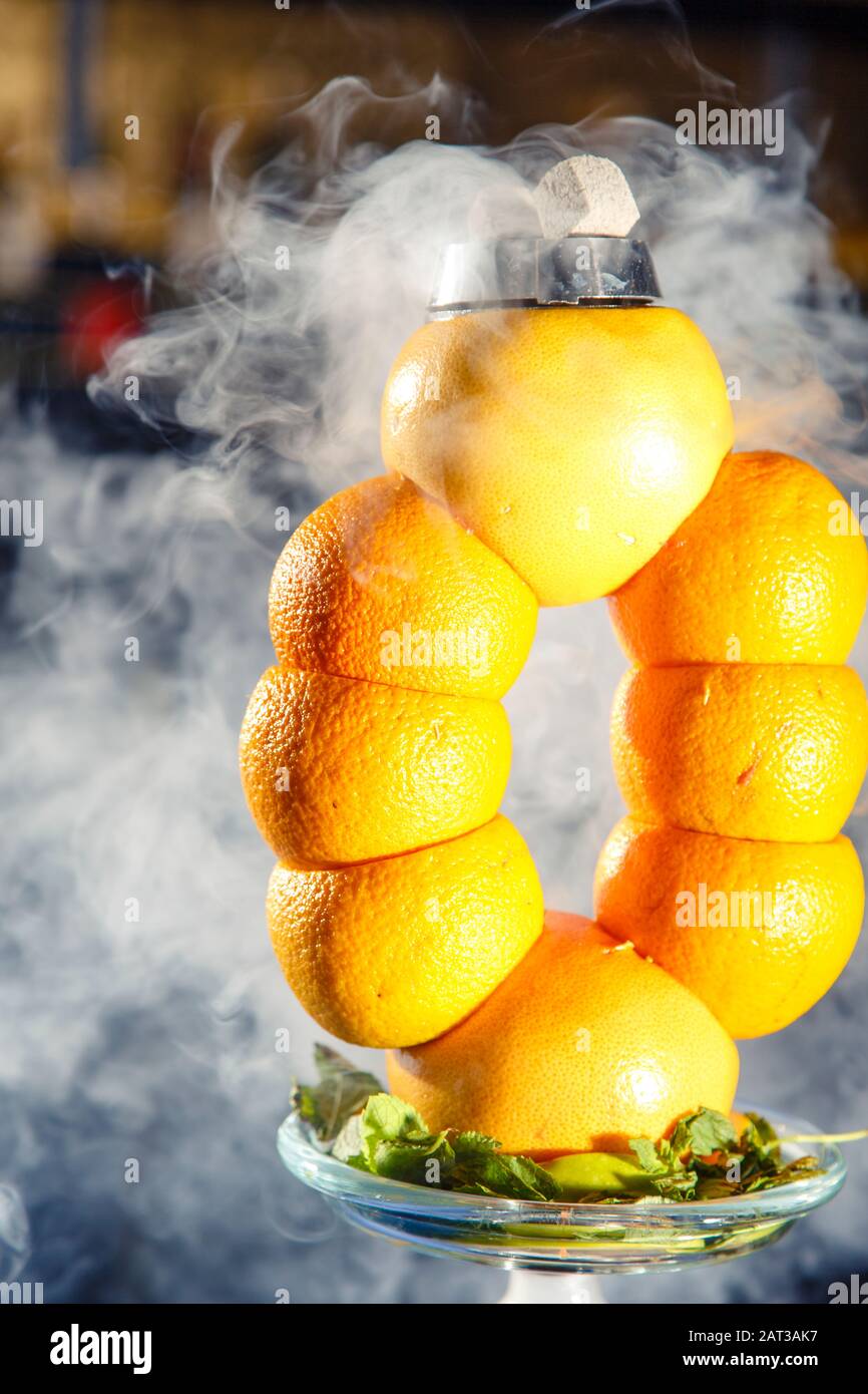 Hookah on the orange. Orange hookah. Hookah with a round transparent ...