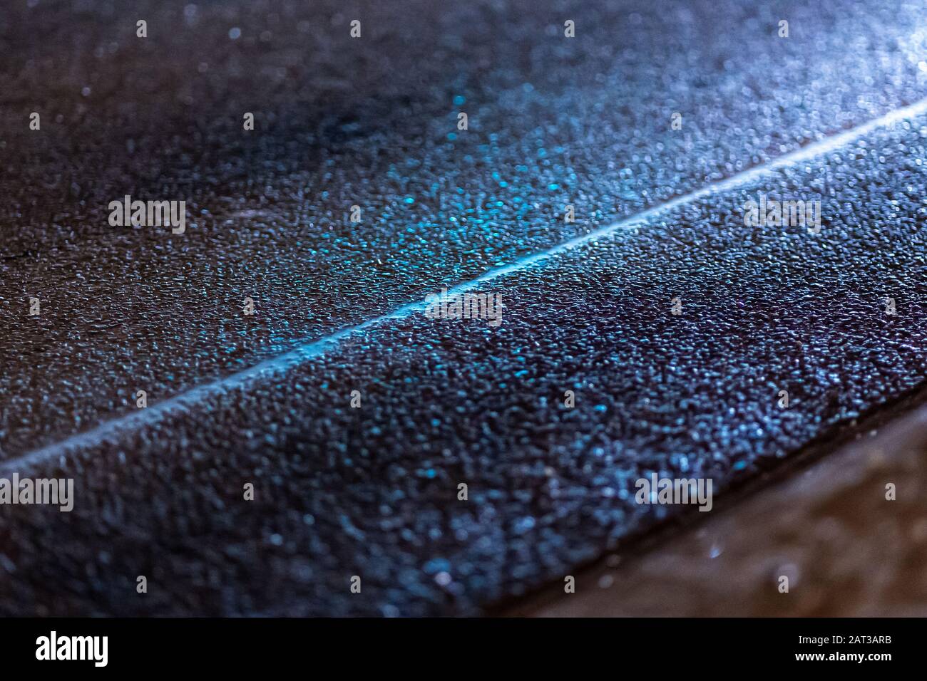 High angle shot of a white line on the asphalt ground Stock Photo - Alamy