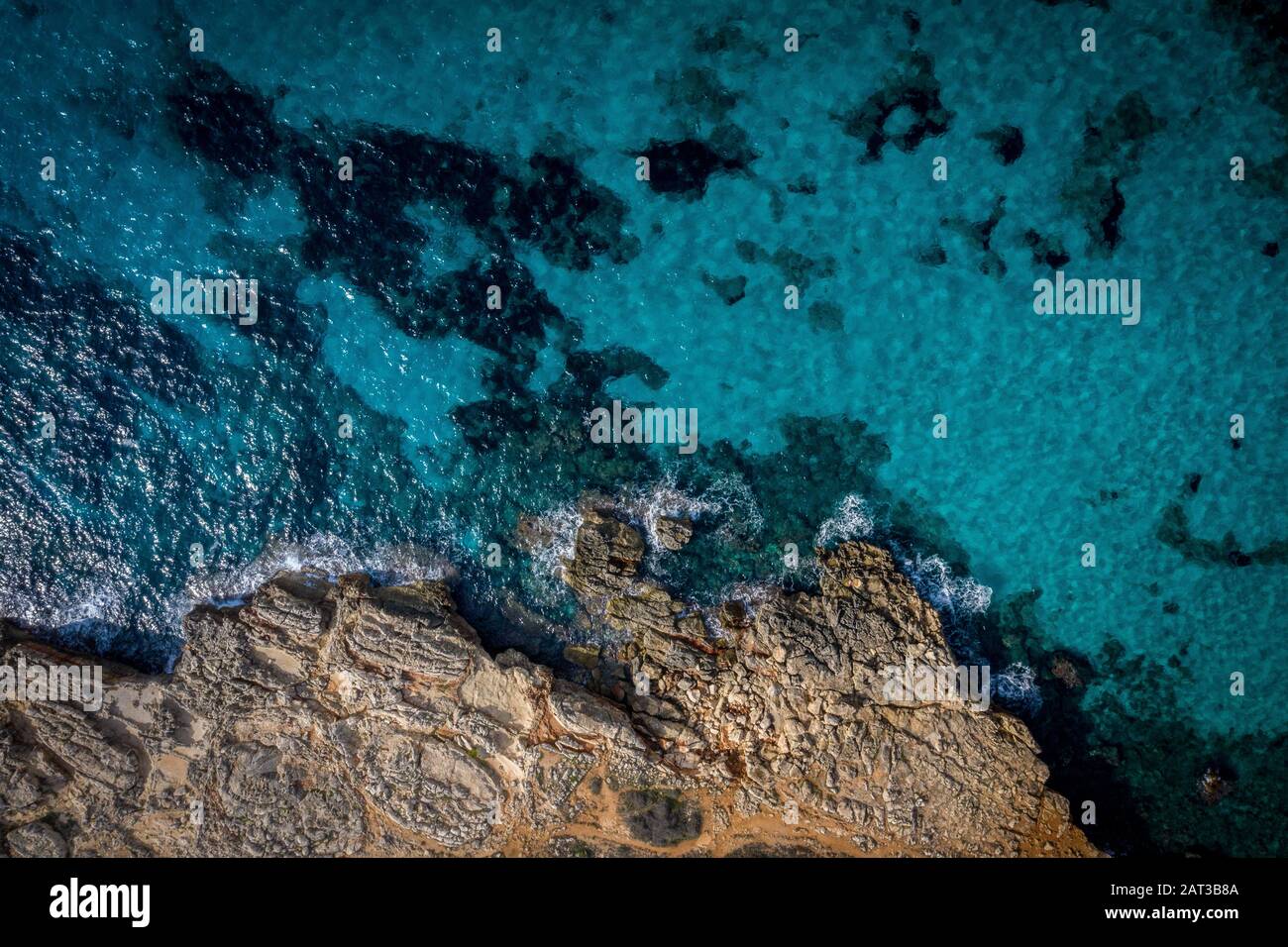 Aerial above the rocky coastline Stock Photo - Alamy