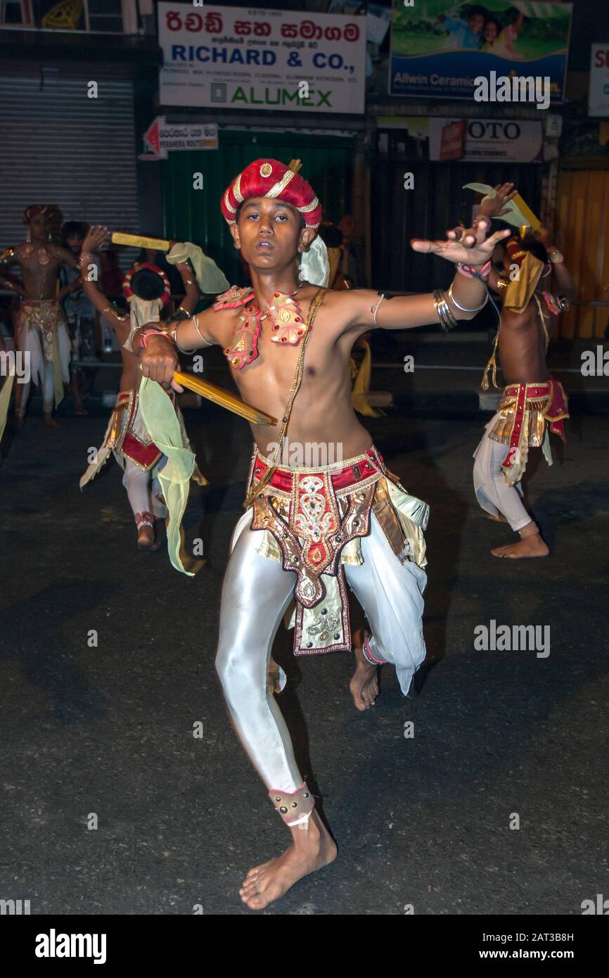 Pathuru Dancers perform along a street at Kandy in Sri Lanka during the ...