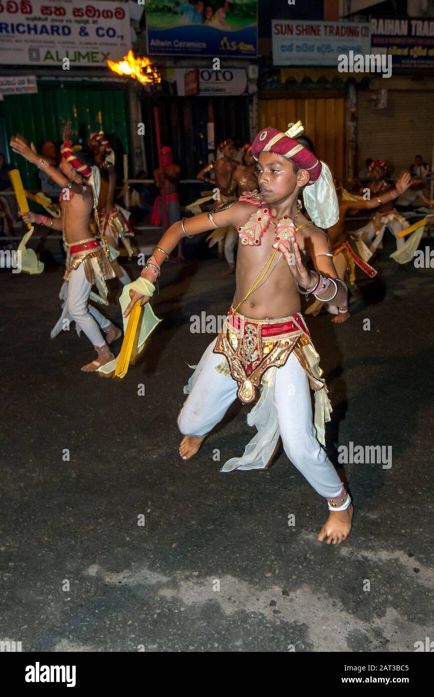 Pathuru Dancers perform along a street at Kandy in Sri Lanka during the ...