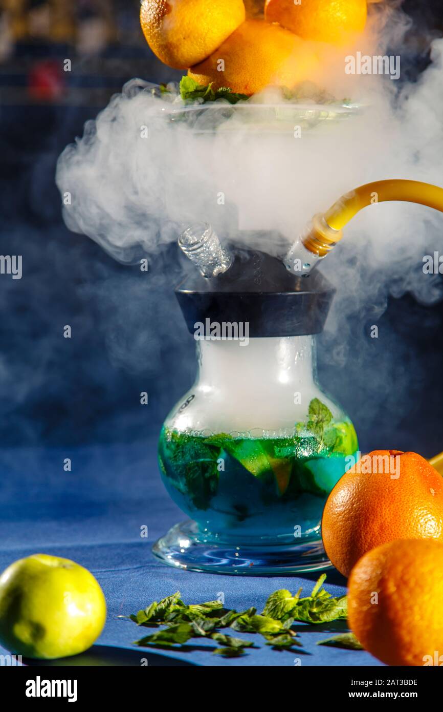 Hookah on the orange. Orange hookah. Hookah with a round transparent ...