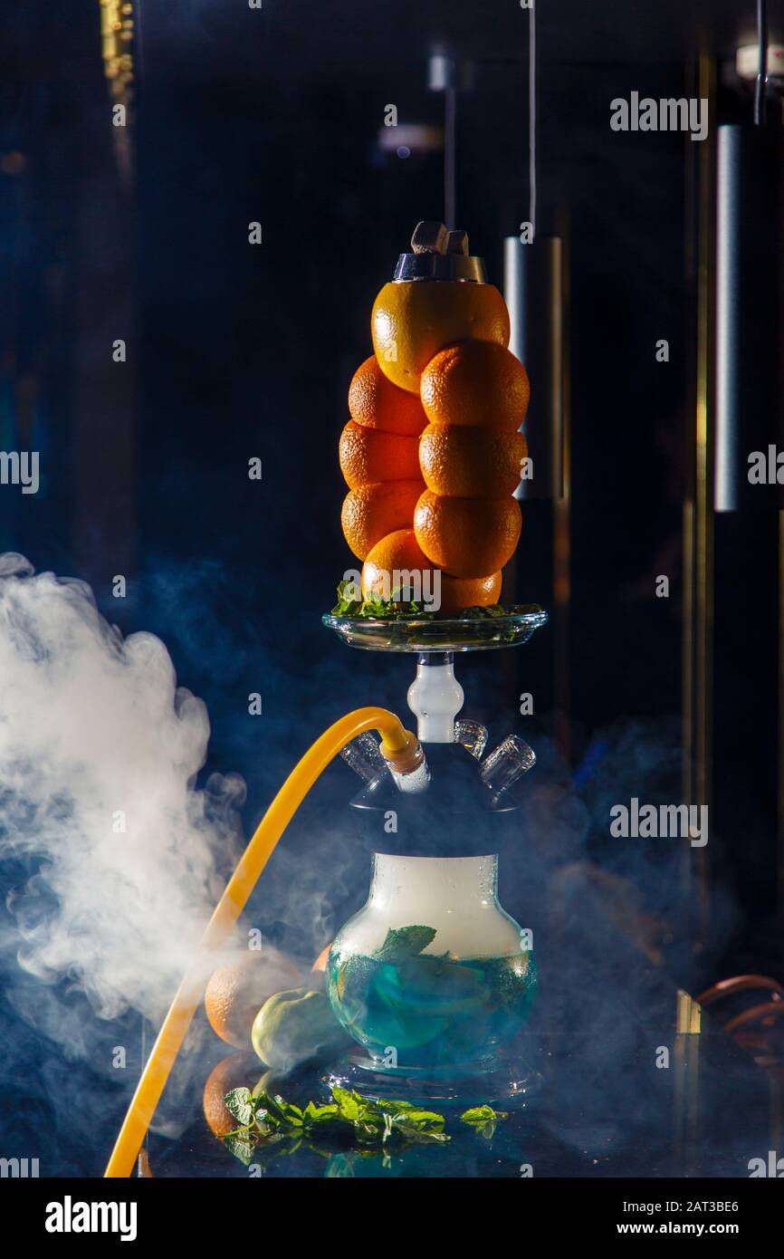 Hookah on the orange. Orange hookah. Hookah with a round transparent ...
