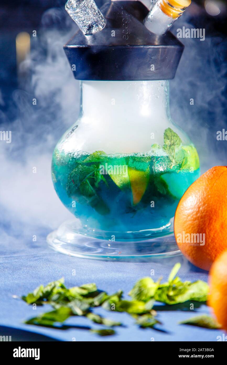 Hookah on the orange. Orange hookah. Hookah with a round transparent ...