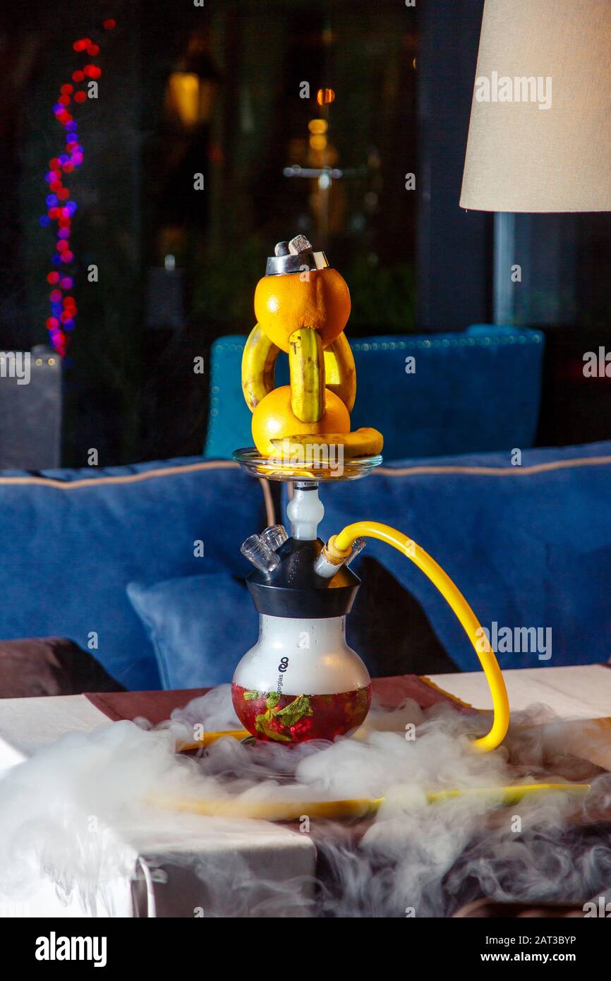 Hookah on the orange. Orange hookah. Hookah with a round transparent ...