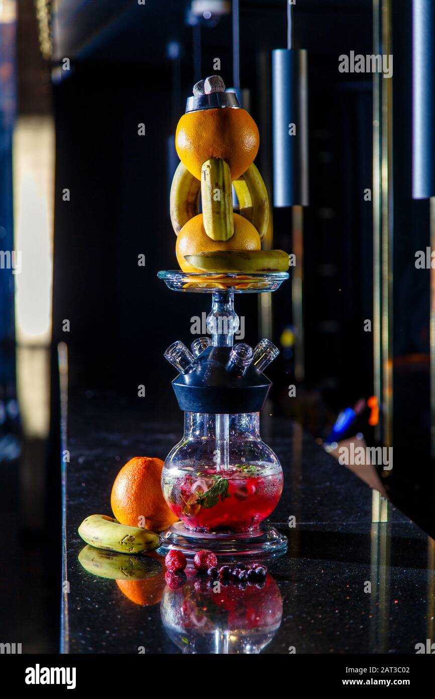 Hookah on the orange. Orange hookah. Hookah with a round transparent ...