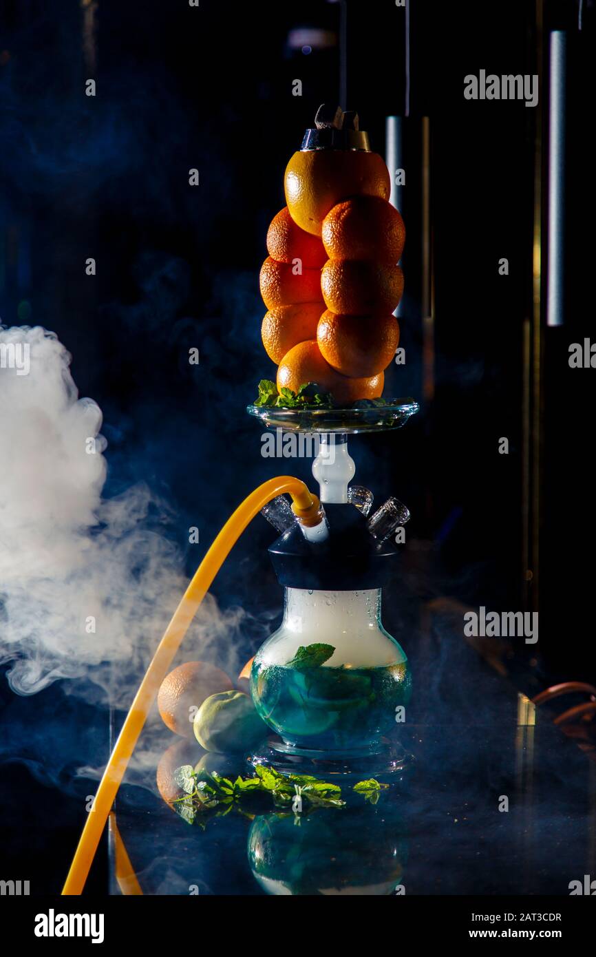 Hookah on the orange. Orange hookah. Hookah with a round transparent ...