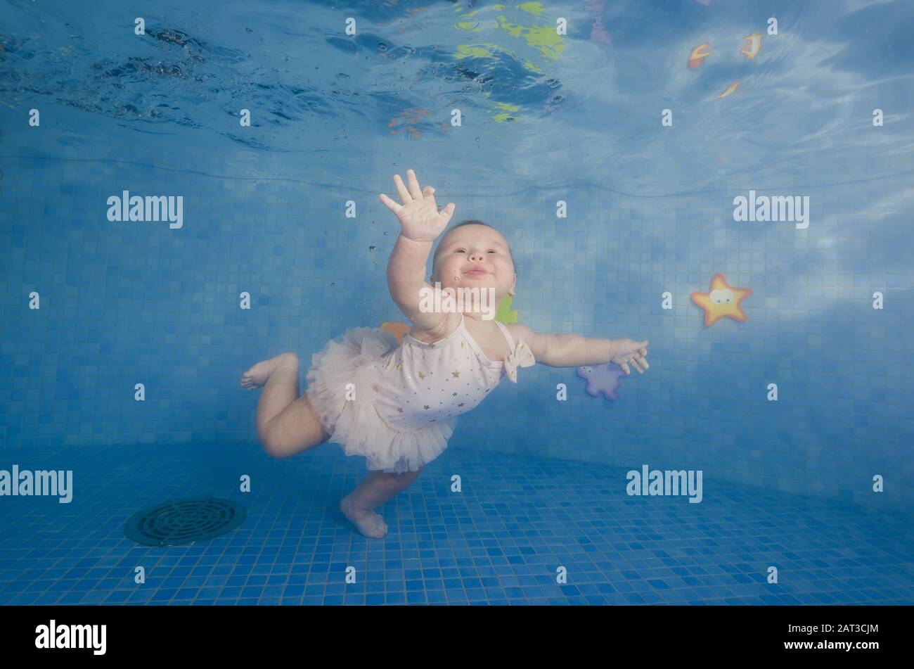 Baby swimming underwater hi-res stock photography and images - Alamy