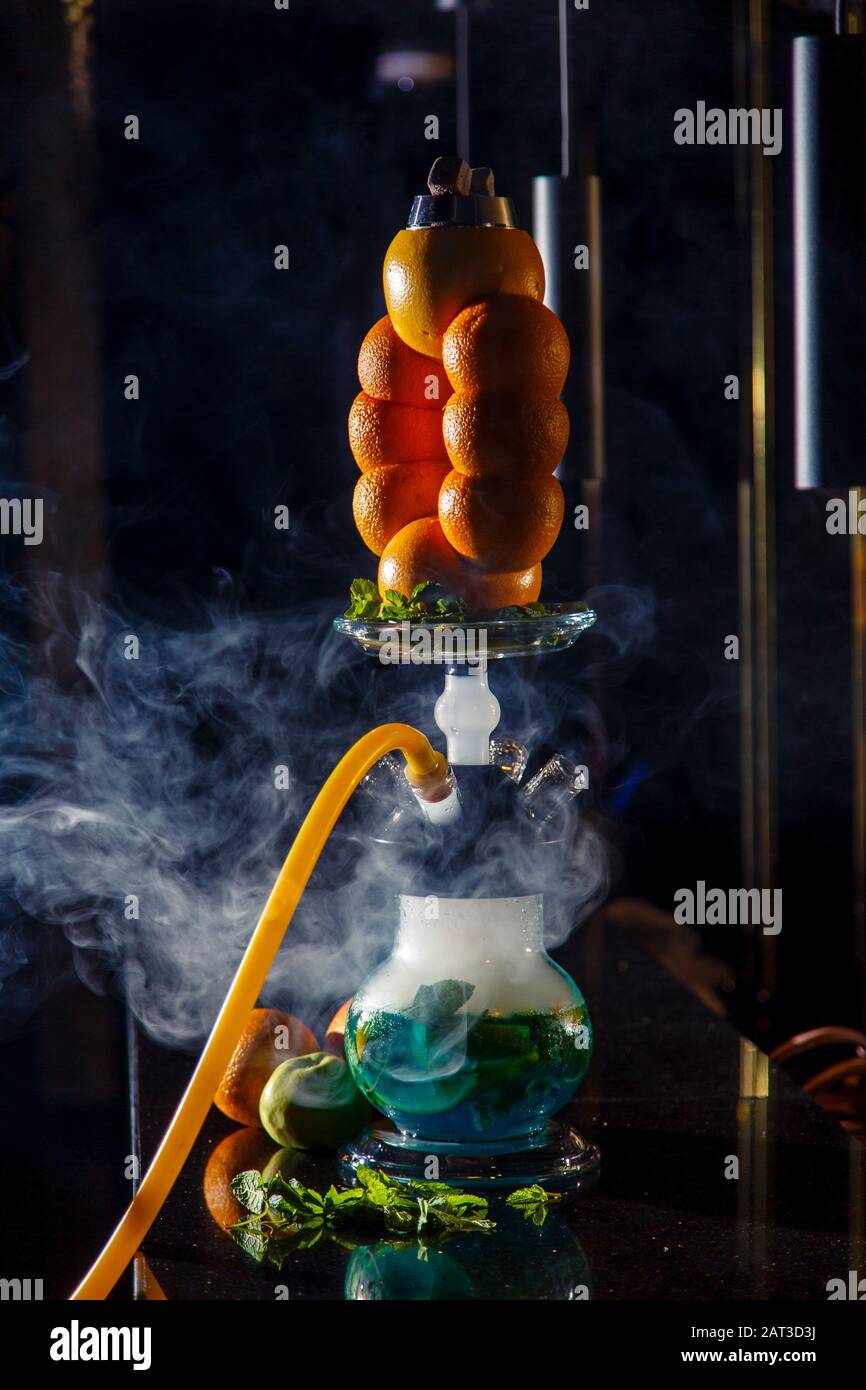 Hookah on the orange. Orange hookah. Hookah with a round transparent ...
