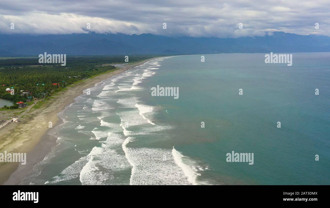 The coast with hotels and tourists, a famous place for surfing in the ...
