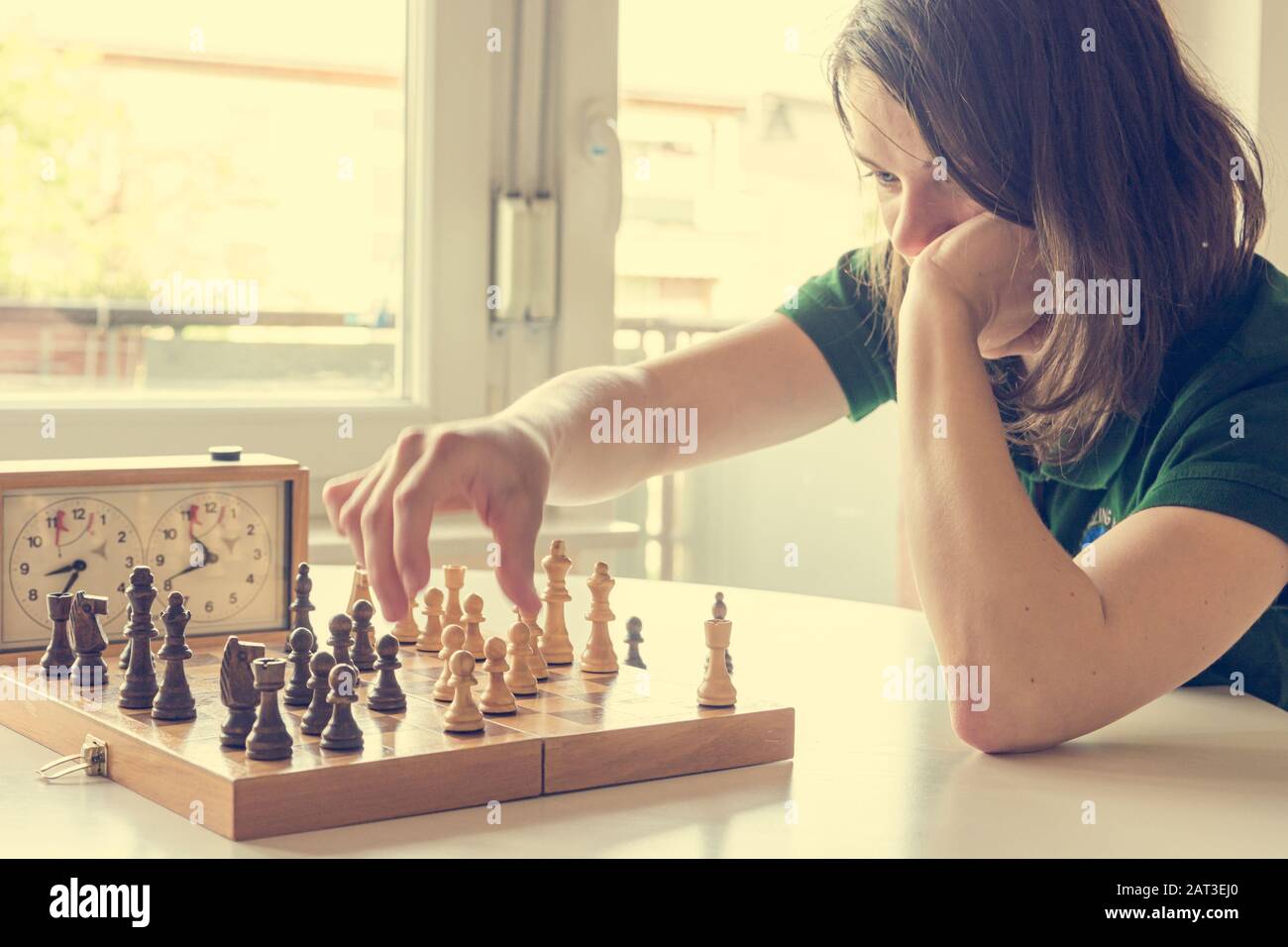 Black student playing chess hi-res stock photography and images - Alamy
