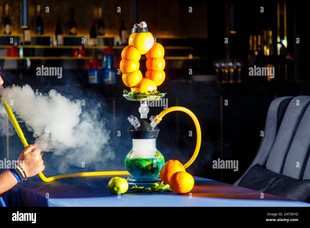 Hookah on the orange. Orange hookah. Hookah with a round transparent ...