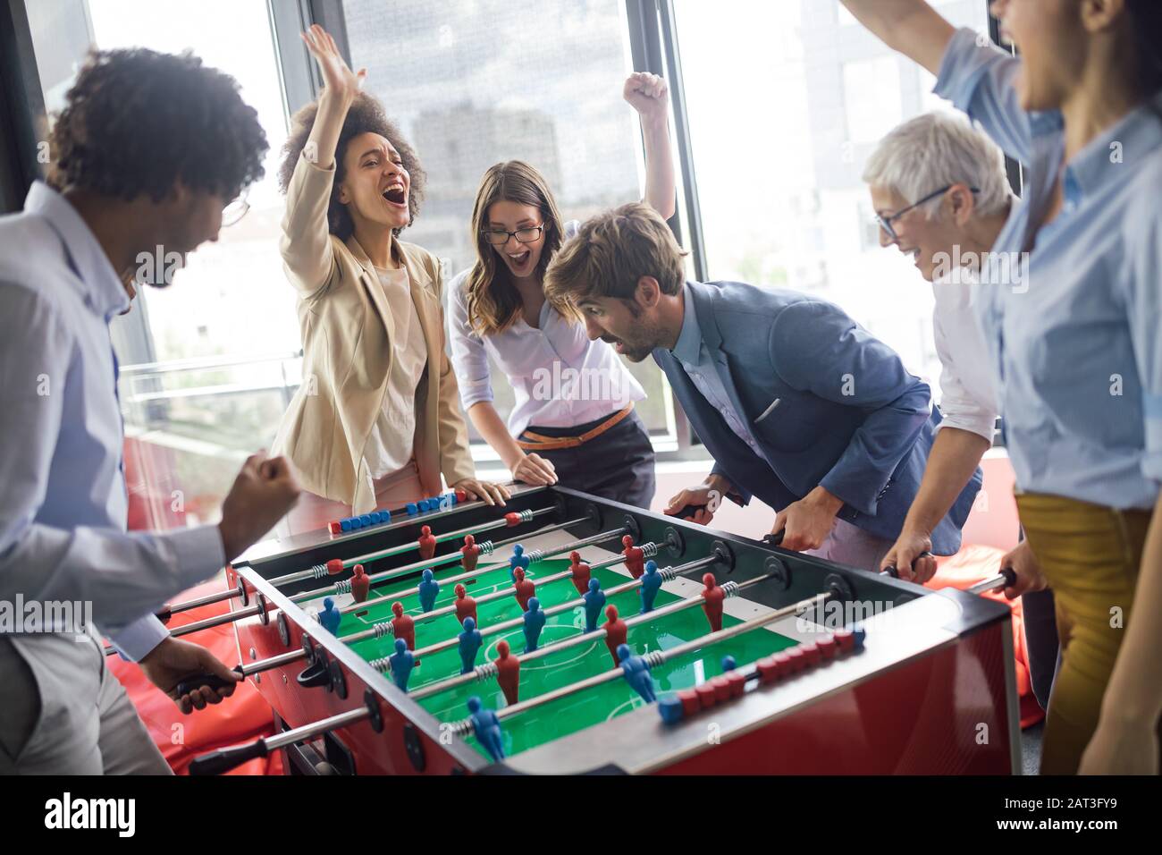 Business team celebrating a good job in the office Stock Photo - Alamy