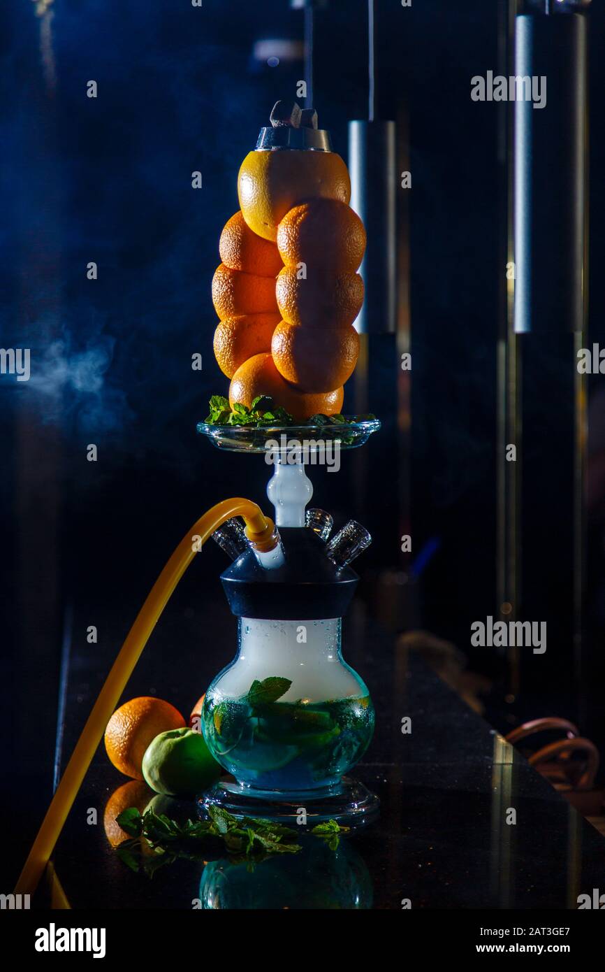 Hookah on the orange. Orange hookah. Hookah with a round transparent ...