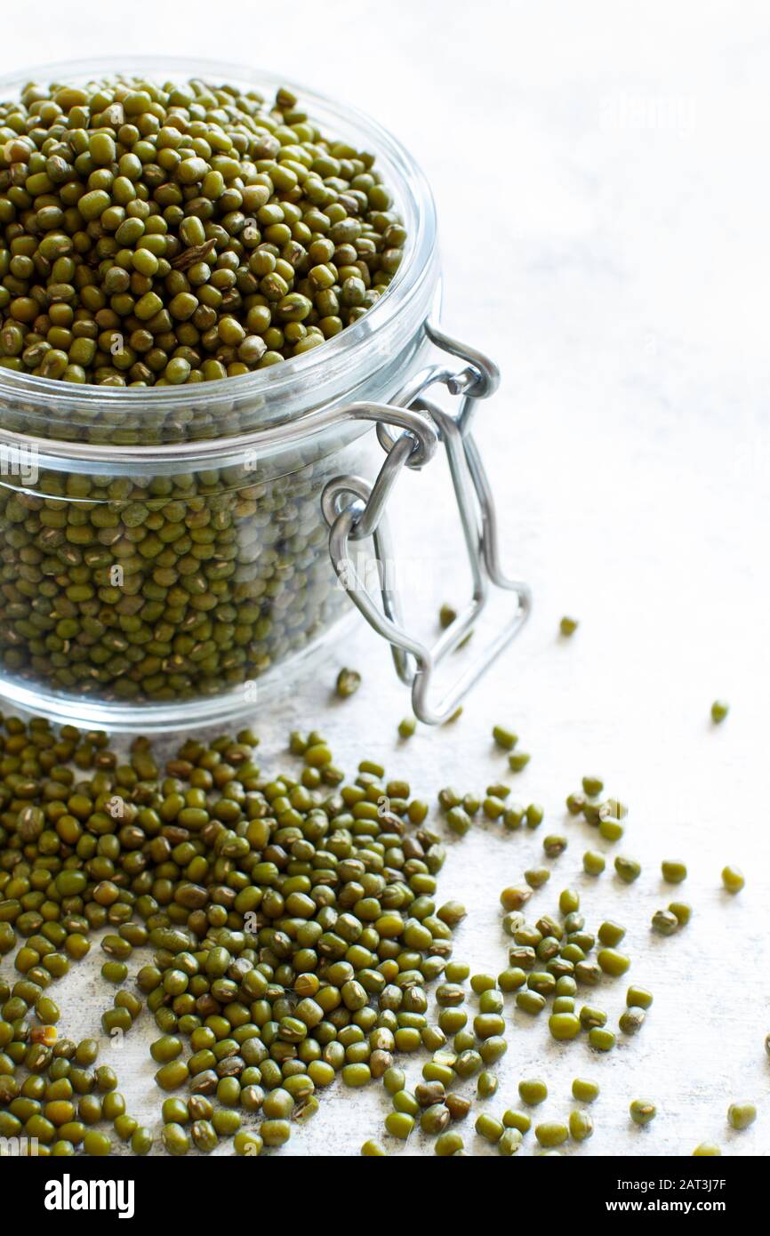 Dried mung beans in a glass jar close up Stock Photo - Alamy