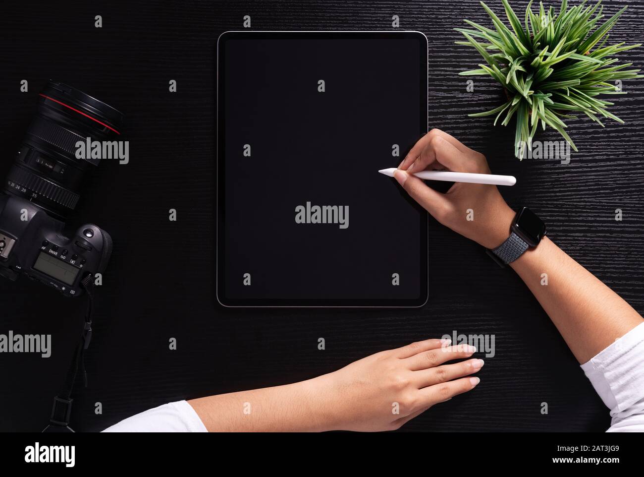 designer using stylus pen on top view Stock Photo - Alamy