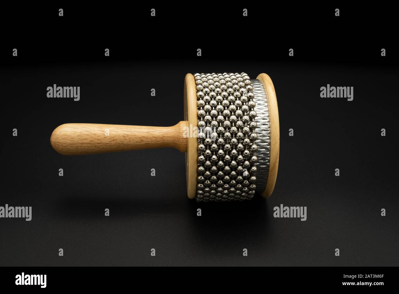 Closeup of a cabasa in front of black background Stock Photo - Alamy