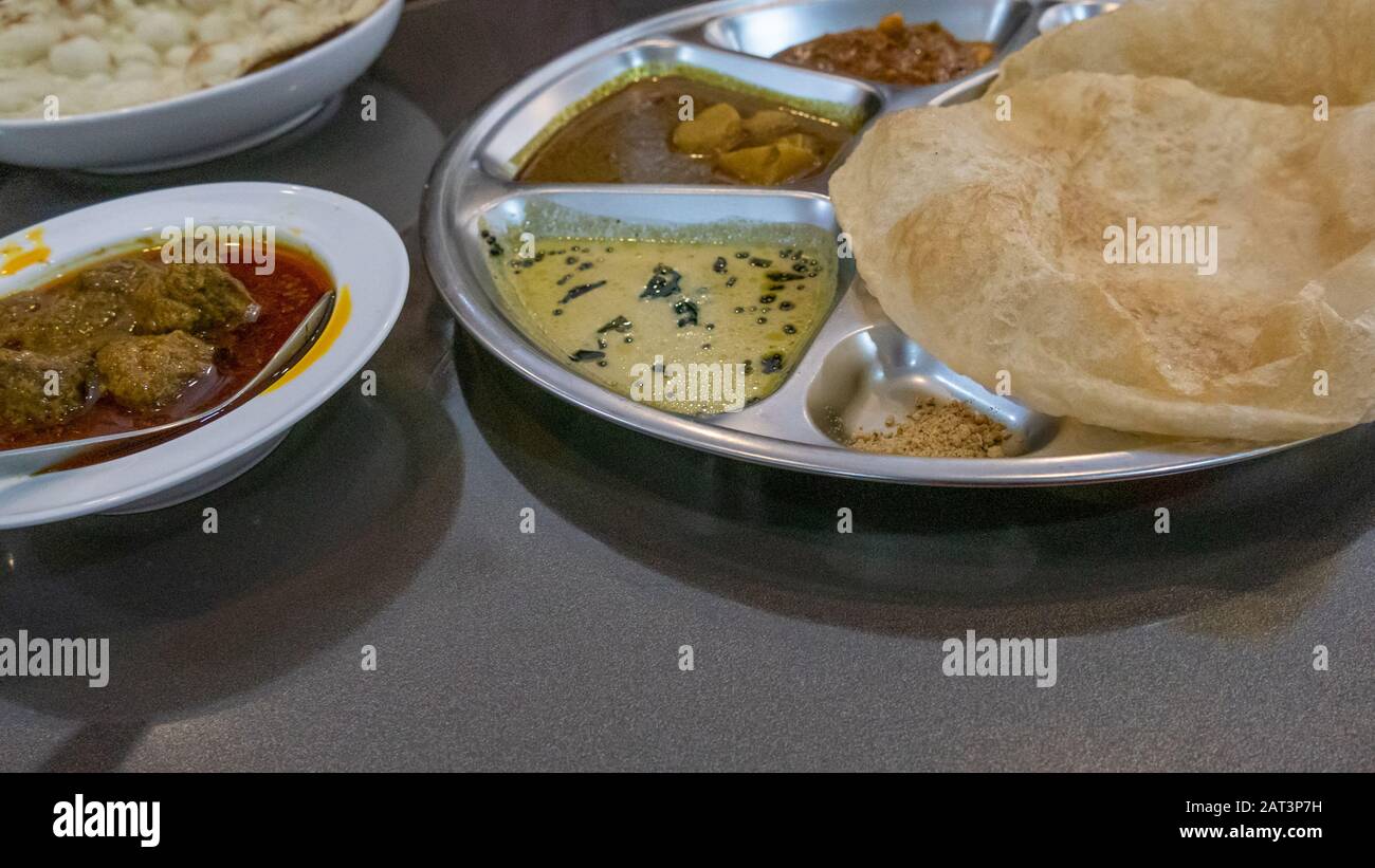 Burmese Naan Flatbread Served With A Variety Of Dipping Sauces Stock