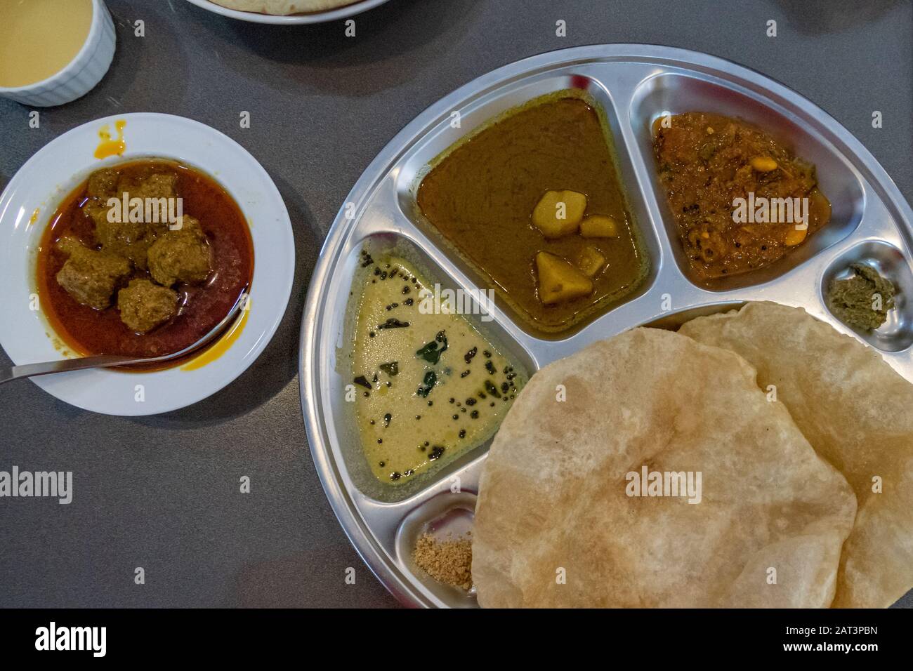 Burmese Naan Flatbread Served With A Variety Of Dipping Sauces Stock