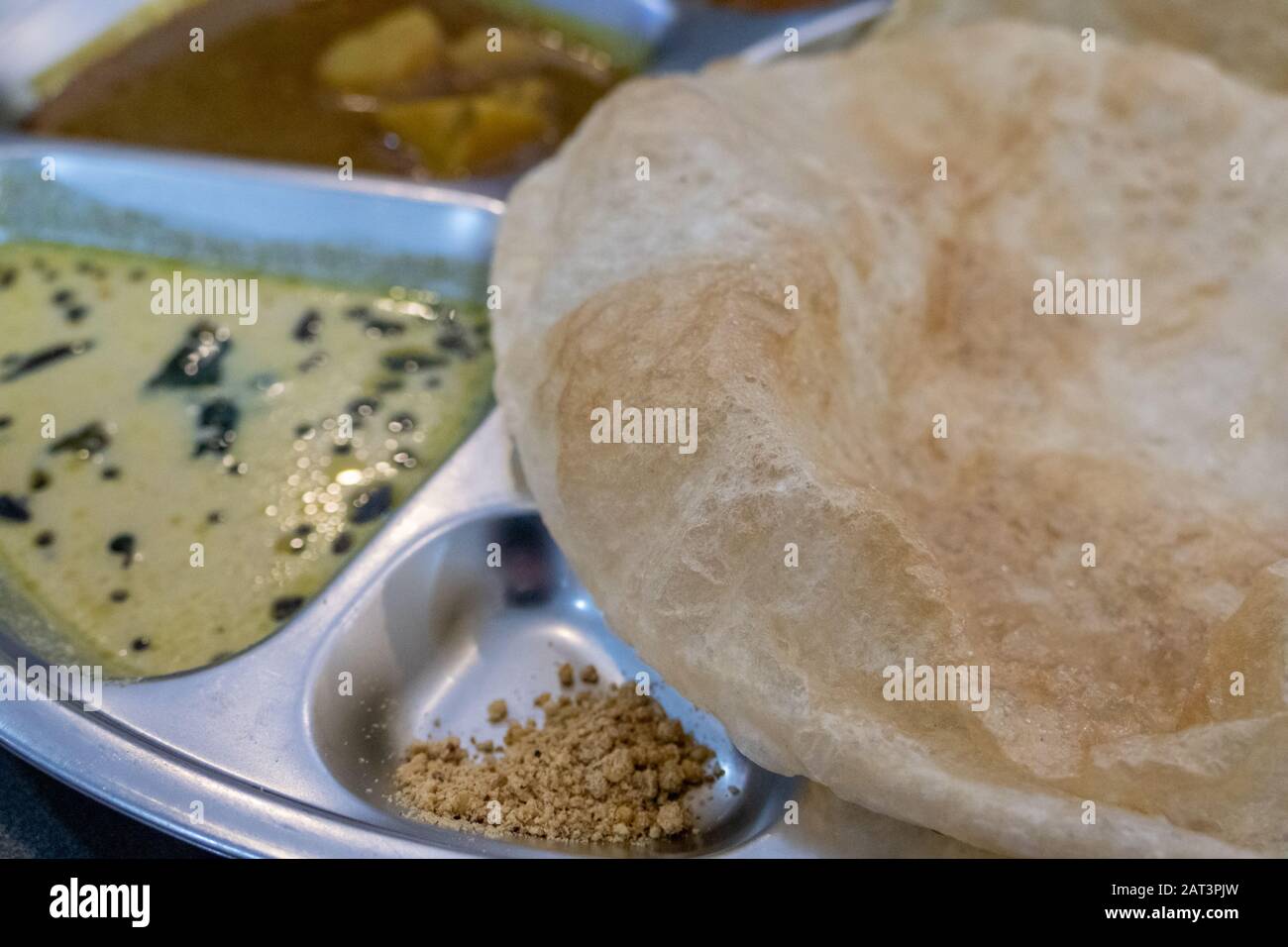 Burmese Naan Flatbread Served With A Variety Of Dipping Sauces Stock