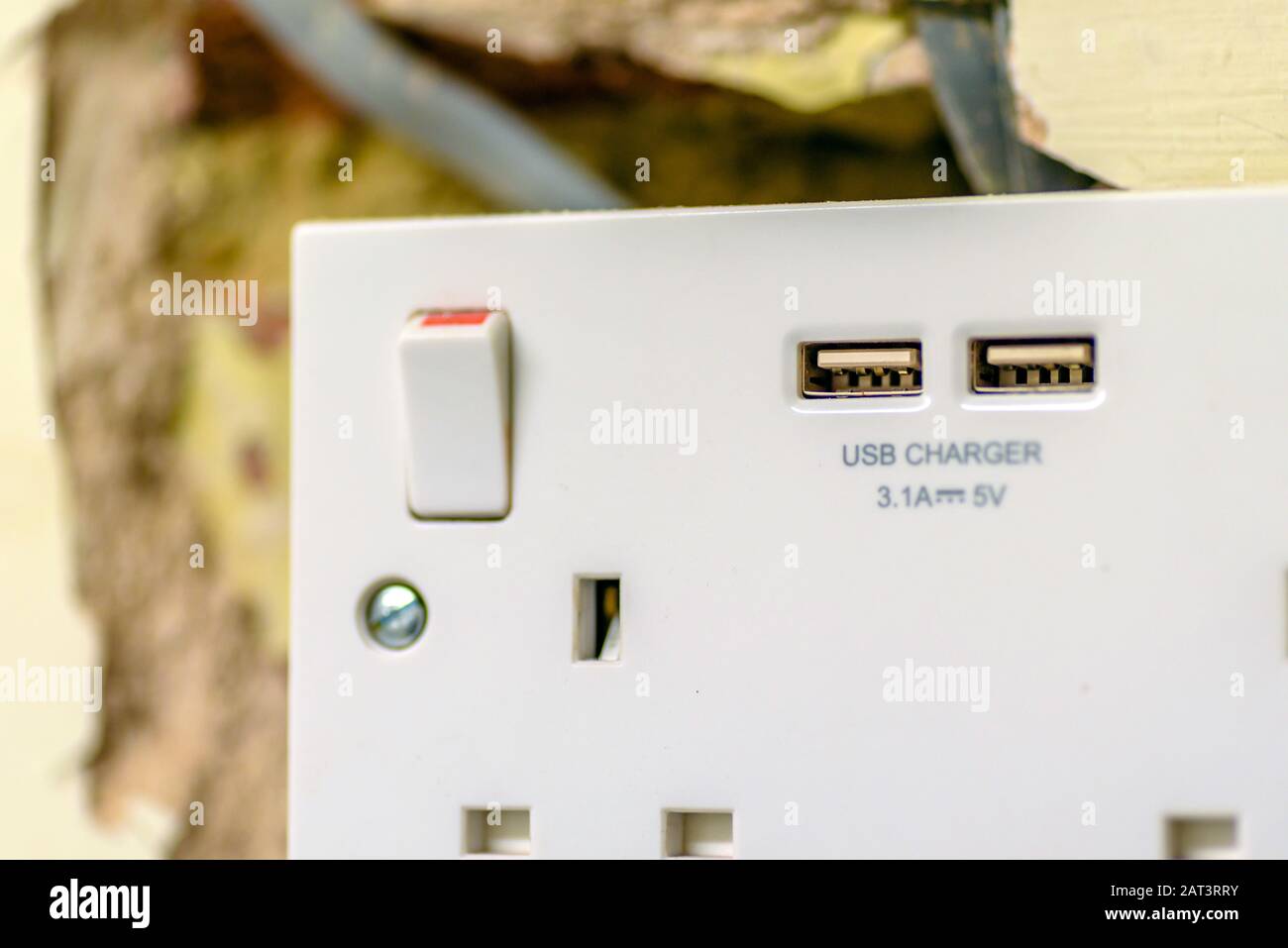 electric socket in a wall during renovation in england uk Stock Photo ...